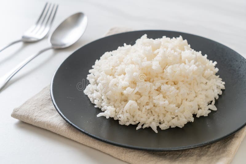 Cooked rice on plate stock photo. Image of lunch, food - 199083376