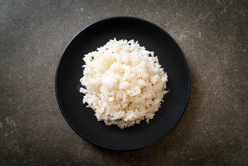 Cooked rice on plate stock image. Image of bowl, plate - 205933431