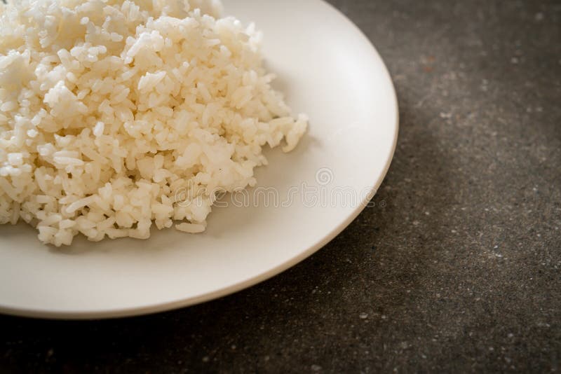 Cooked rice on plate stock photo. Image of grain, diet - 211220834