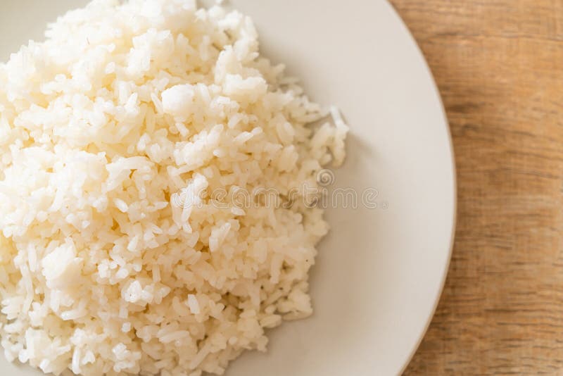 Cooked rice on plate stock photo. Image of cereal, cuisine - 219185532