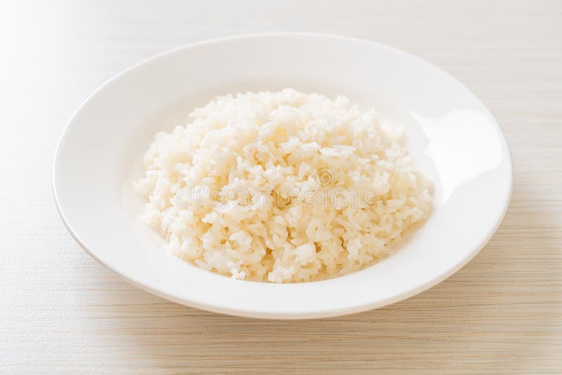 Cooked rice on plate stock photo. Image of rice, boiled - 221273988