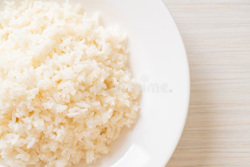 Cooked rice on plate stock photo. Image of rice, dinner - 221452604