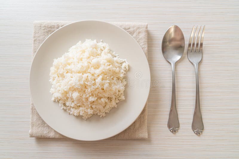 Cooked rice on plate stock image. Image of food, cuisine - 221780973