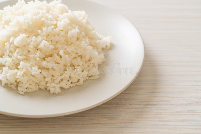Cooked rice on plate stock photo. Image of lunch, plate - 224388162