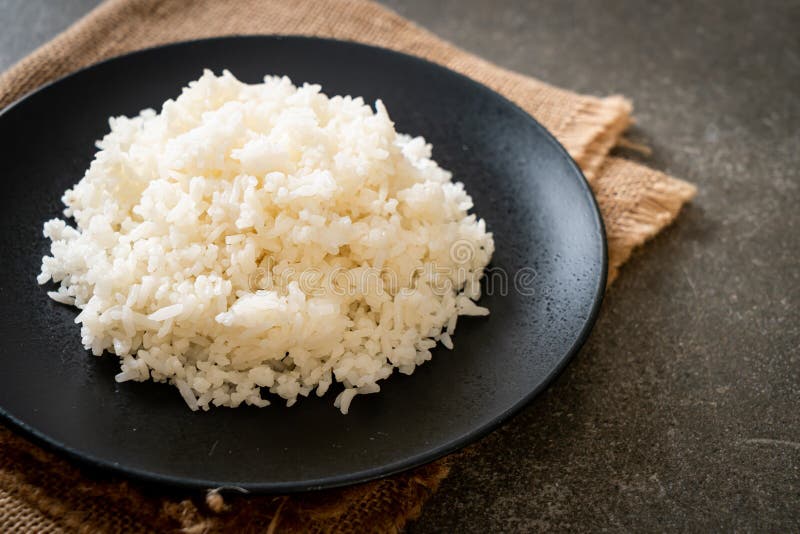 Cooked rice on plate stock photo. Image of eating, healthy - 225387228