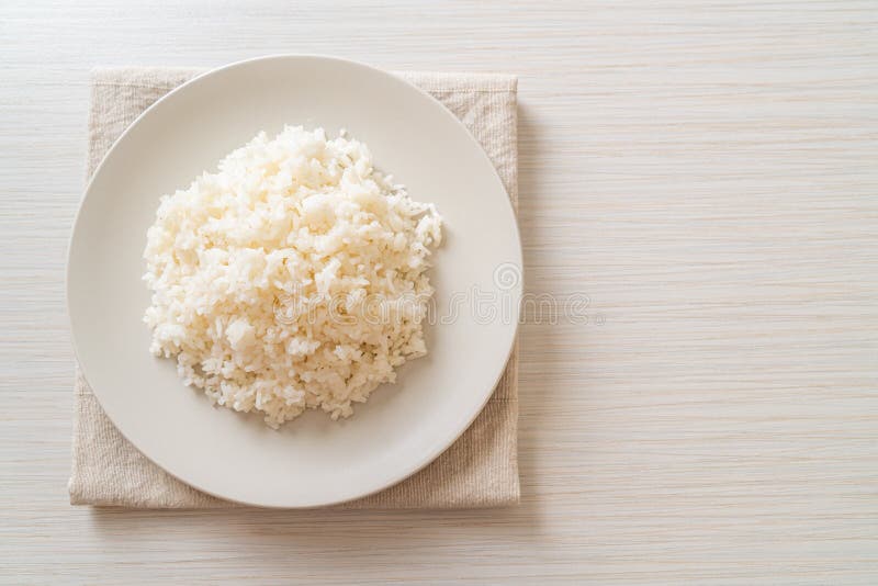 Cooked rice on plate stock photo. Image of background - 227452106
