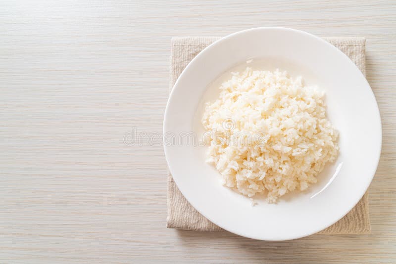 Cooked rice on plate stock photo. Image of jasmine, carbohydrate ...