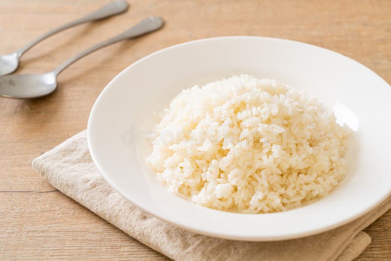 Cooked rice on plate stock photo. Image of full, grain - 233212192