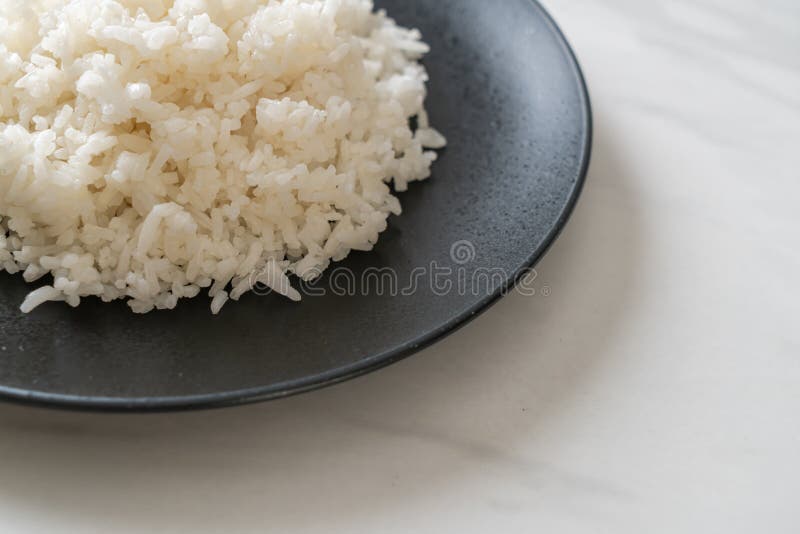 Cooked rice on plate stock image. Image of health, grain - 247517477