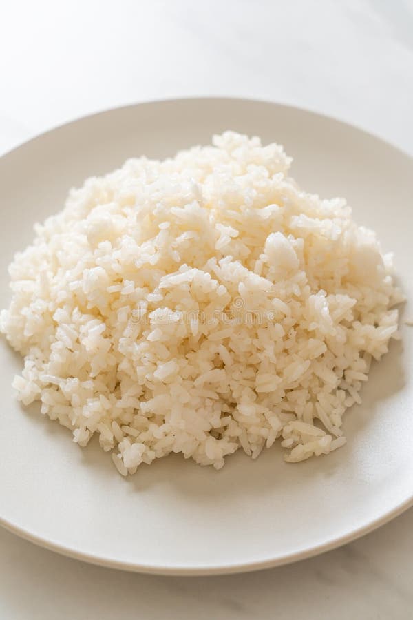 Cooked rice on plate stock photo. Image of isolated - 257208276