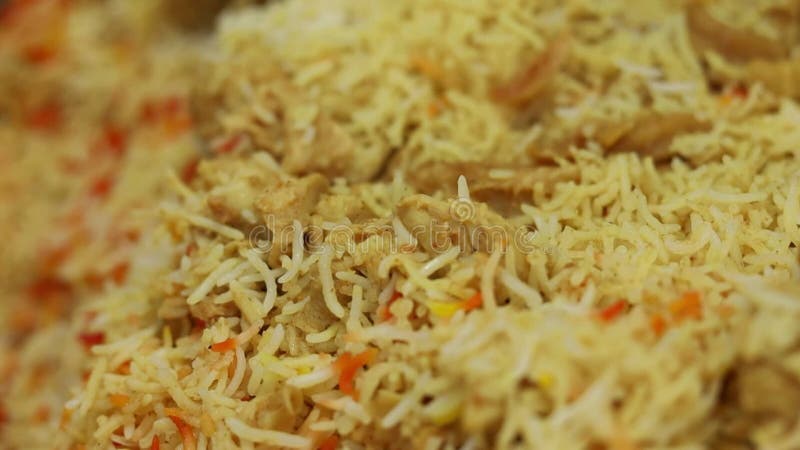 Cooked Rice with Vegetables and Chicken Biryani Garnished Stock Video ...