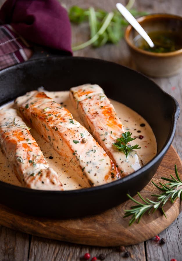 Cooked Salmon Fish with Cream Sauce in Frying Pan Stock Photo - Image of fillet, cooked: 283935074