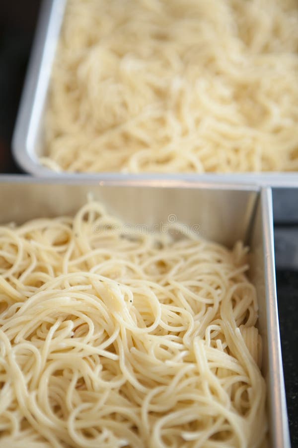 Cooked spaghetti on tray stock photo. Image of dish, yellow - 50088090
