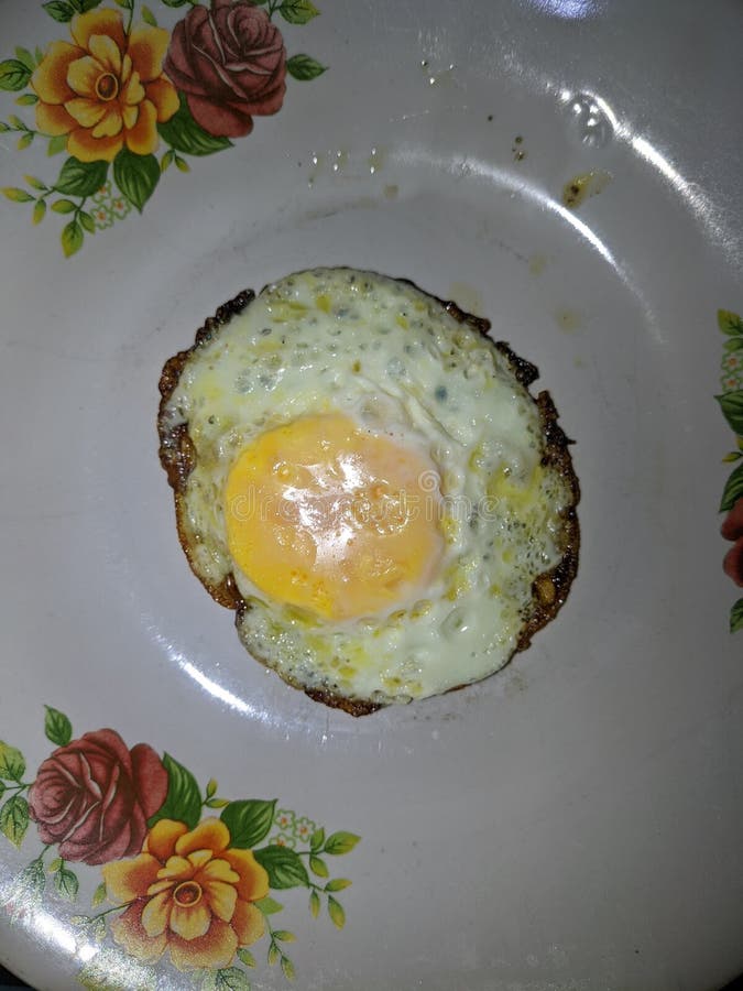 Cooked Sunny Side Up Egg on a Plate Stock Photo - Image of protein ...
