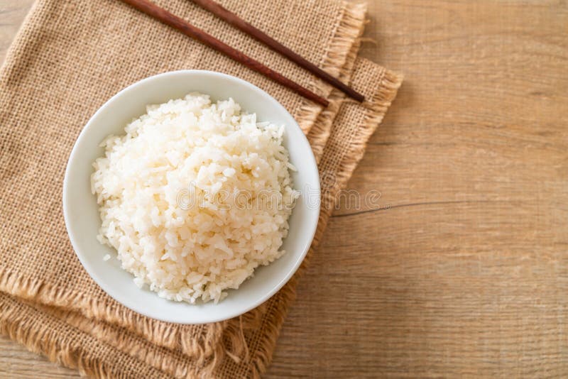 Cooked white rice bowl stock photo. Image of cereal - 220965640