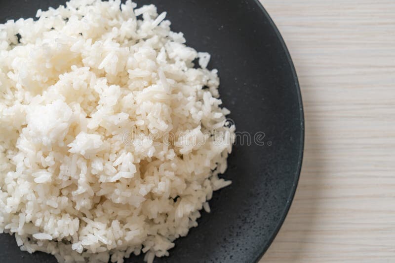 Cooked rice on plate stock photo. Image of ingredient - 219815168