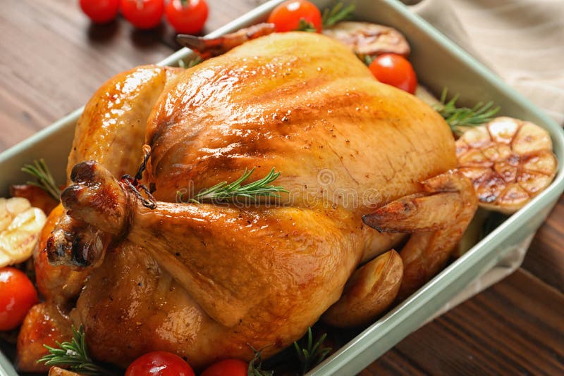 Cooked Turkey with Vegetables and Rosemary in Dish on Table Stock Image ...