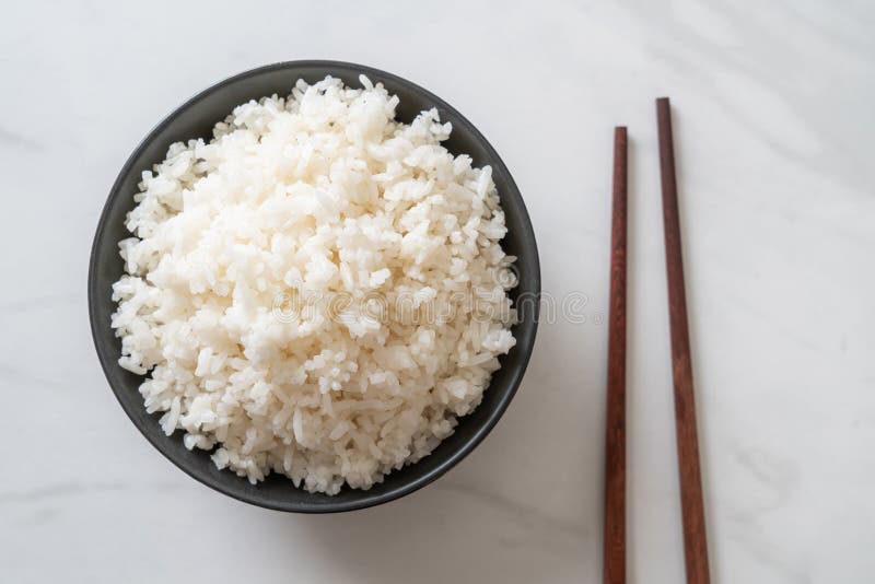 Cooked white rice bowl stock image. Image of cereal - 197042851
