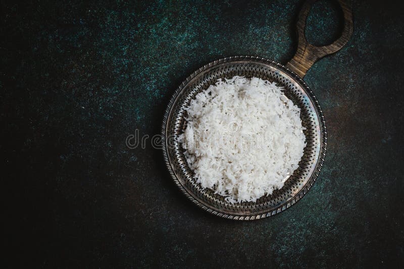 Cooked White Rice on Rustic Metal Tray on Dark Table Stock Photo ...
