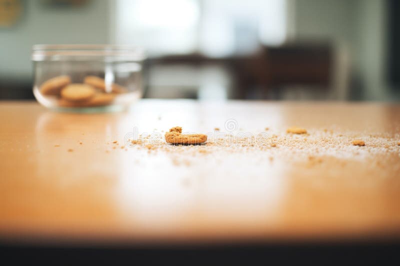 Cookie Crumbs on a Plain Table Stock Photo - Image of crumbs, snack ...