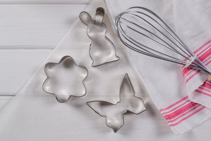 Cookie Cutters and Kitchen Tools on Parchment Paper Stock Image - Image ...