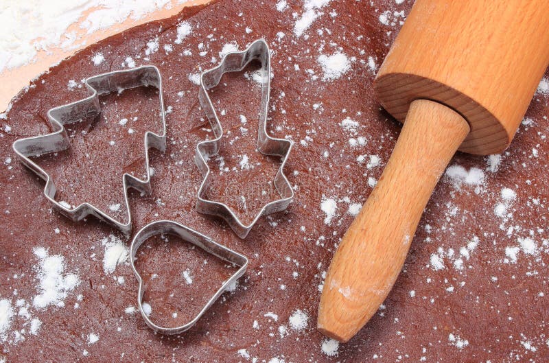 Cookie Cutters and Rolling Pin on Dough for Gingerbread Stock Photo ...