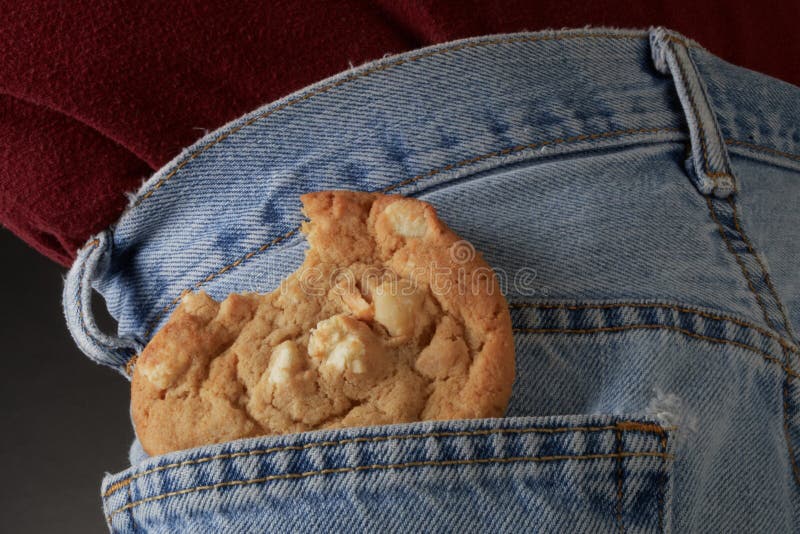 Cookie Stuffed into Pants Pocket Stock Photo - Image of pocket, jeans ...