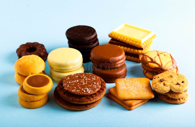Cookies on blue background stock image. Image of dessert - 268363497