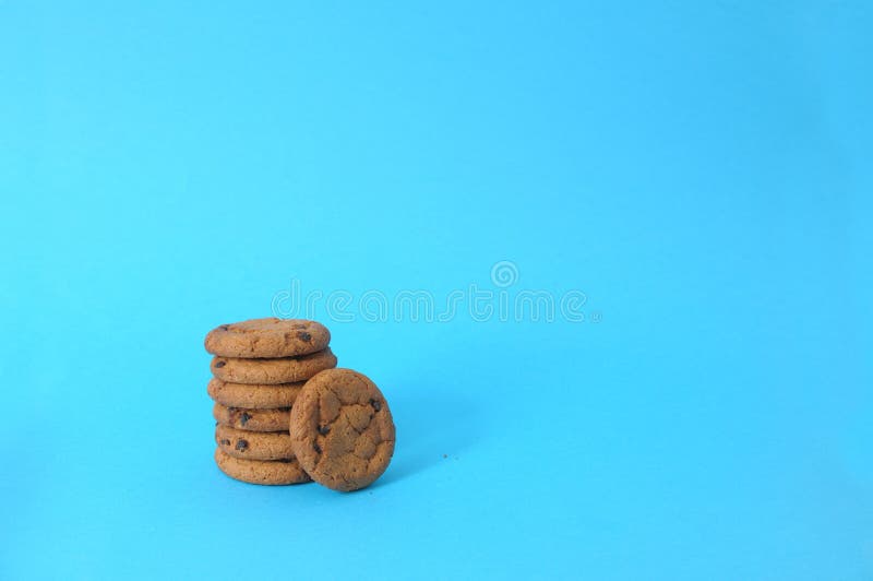 Cookies on Blue Background. Oatmeal Cookie with Pieces of Chocolate ...