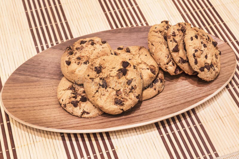 Cookies with Chocolate Chips on the Oval Wooden Stock Photo - Image of ...