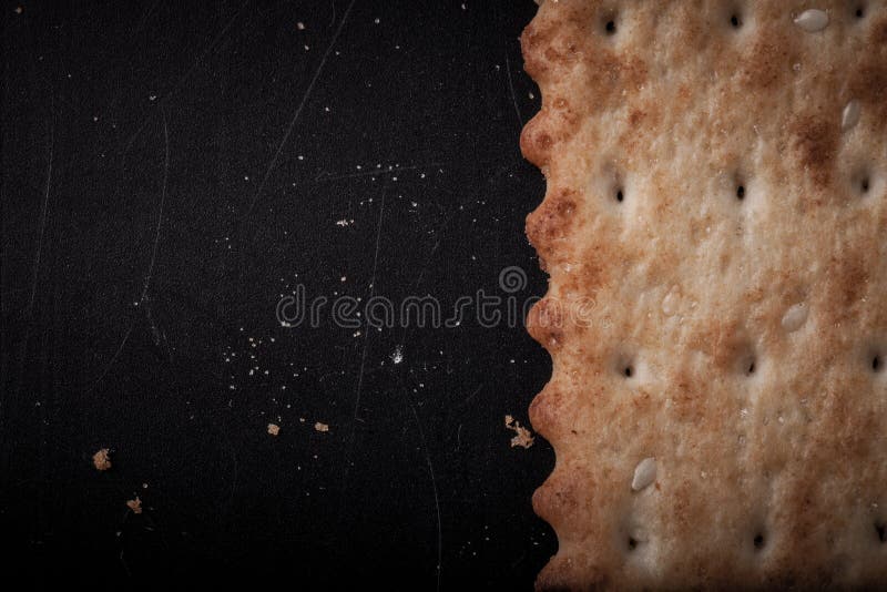 Cookies and Crackers Crumbs on a Dark Background with Place for Stock ...