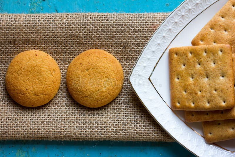 Cookies Crackers in a White Saucer and Matting Stock Image - Image of ...