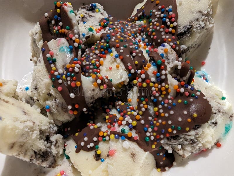 Cookies and Cream Ice Cream with Chocolate Syrup and Sprinkles Stock ...