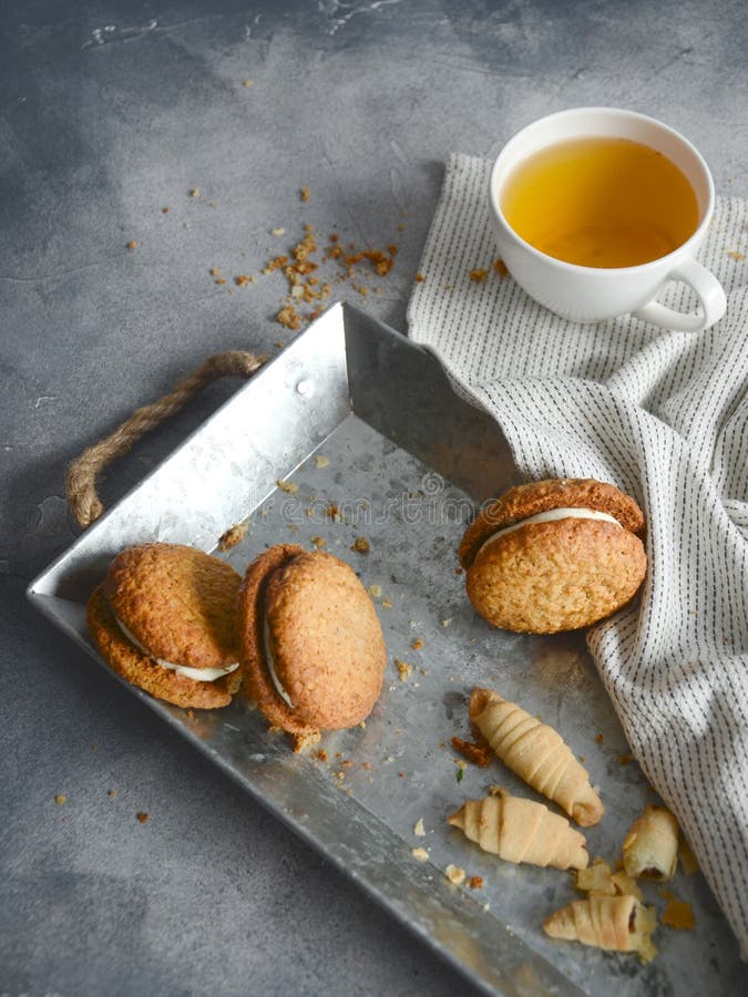 Cookies and Cup of Tea on Iron Plate Stock Image - Image of black ...