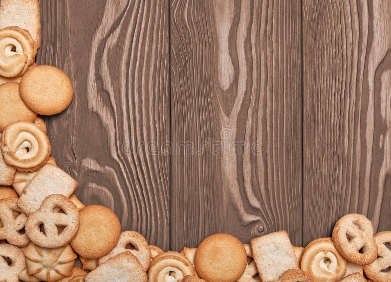 Cookies of Different Shapes on a Wooden Background Stock Photo - Image ...