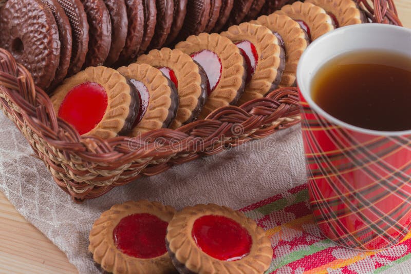 Cookies Filled with Jam and Cup of Tea Stock Image - Image of food ...