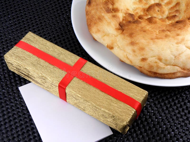 Cookies and Gold Gift Box with Red Ribbon Stock Photo - Image of ...