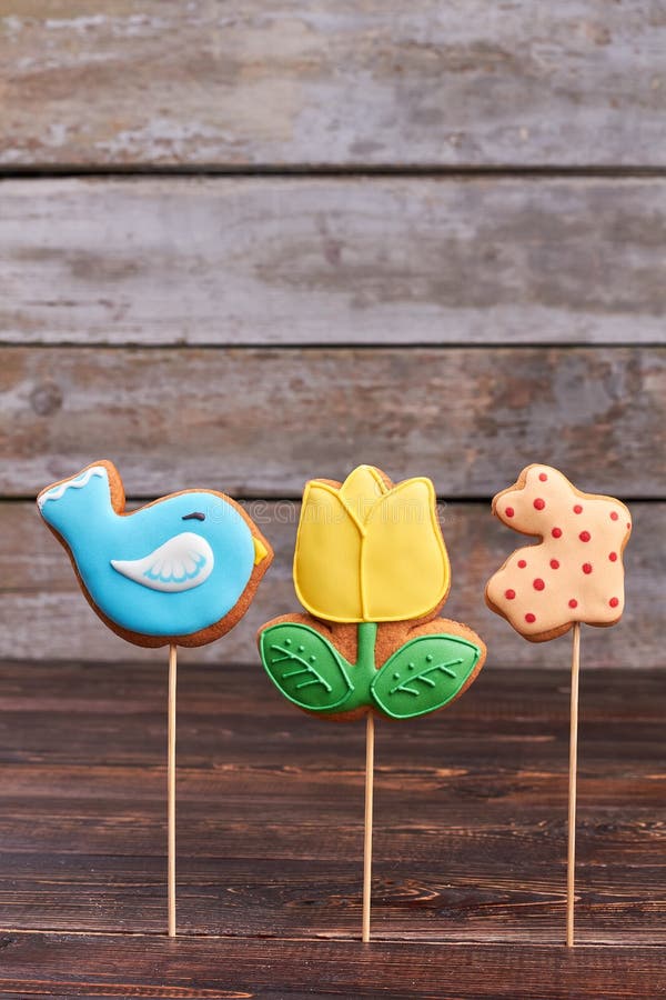 Cookies on Sticks, Wooden Background. Stock Image - Image of ...