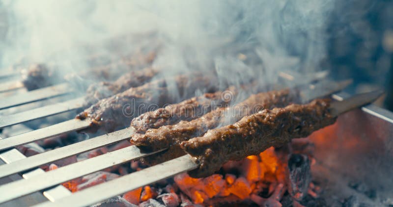 Cooking Adana Kebab on the Barbecue Stock Image - Image of skewer ...