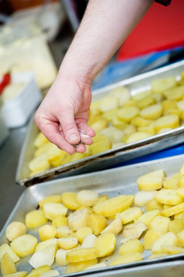 Cooking - Adding Salt and Spicery Stock Image - Image of aromatic ...