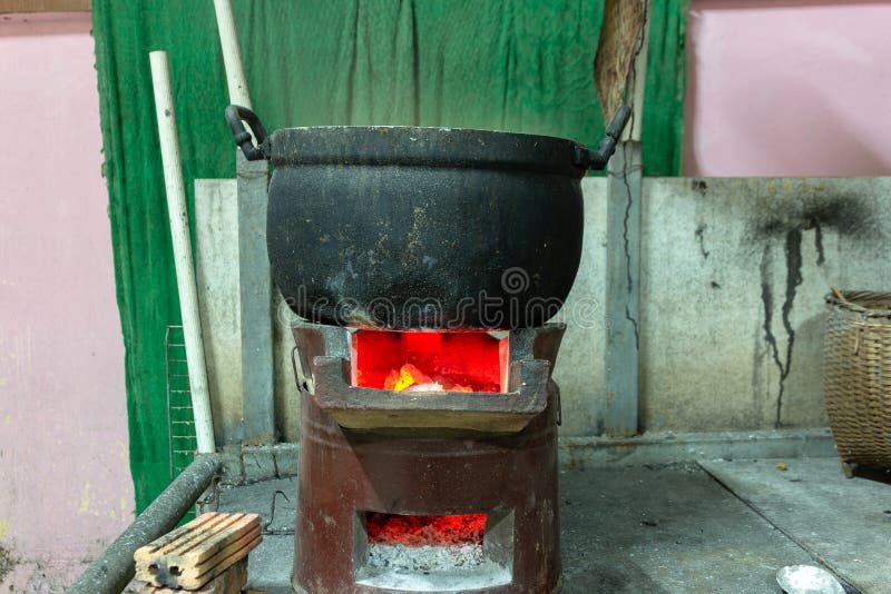 Cooking Aluminum Pot Boiling on Charcoal Burning Stove Stock Image ...