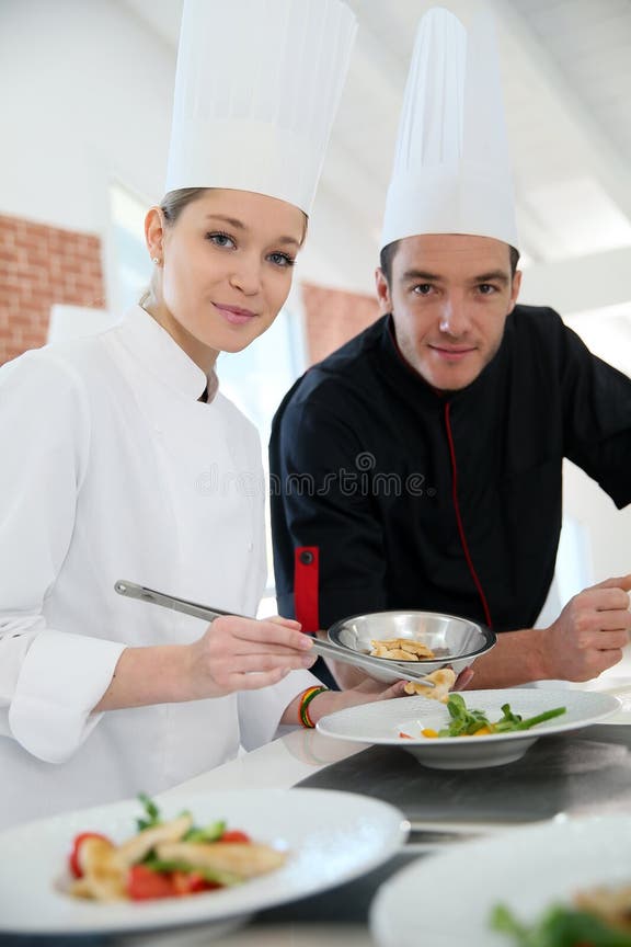 Cooking Apprentice with the Chef Stock Photo - Image of industry ...
