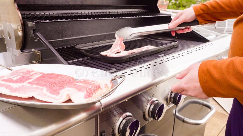 Cooking bacon stock photo. Image of barbeque, bacon - 261395572