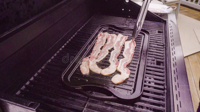 Cooking bacon stock image. Image of barbeque, greasy - 261395897