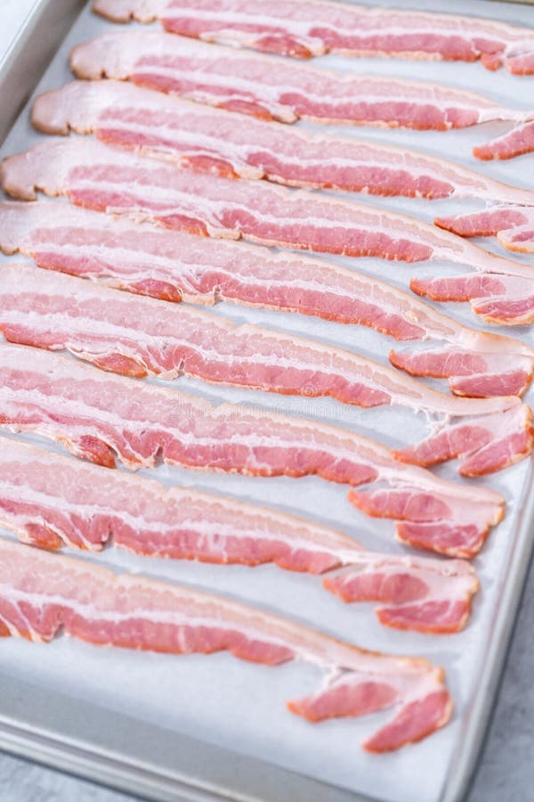 Cooking bacon strips stock photo. Image of preparing - 259652306