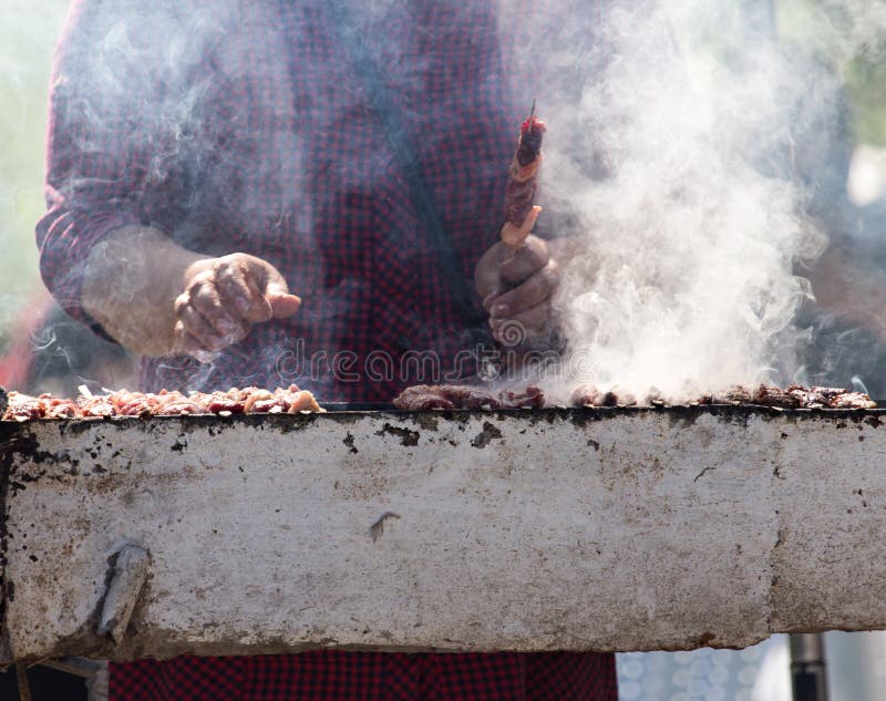 Cooking Barbecue on the Grill in the Open Air Stock Photo - Image of ...