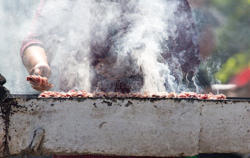 Cooking Barbecue on the Grill in the Open Air Stock Photo - Image of ...
