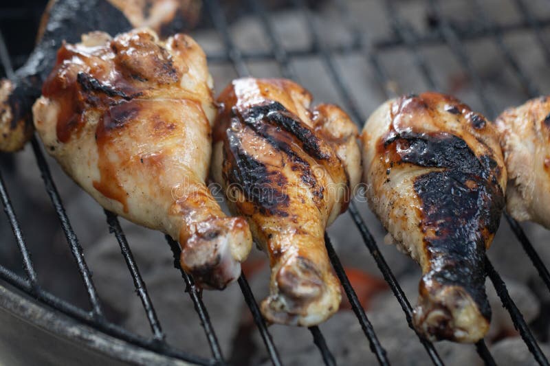 Cooking BBQ Chicken Legs stock photo. Image of slathered - 348710704
