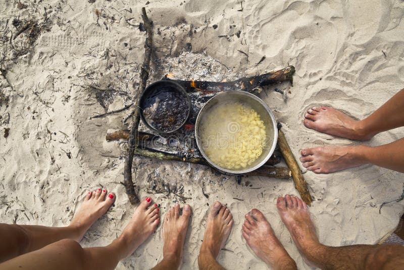 Cooking on the beach stock image. Image of handle, gear - 67570509
