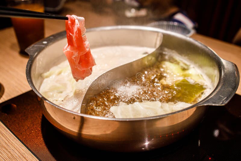Cooking Beef in a Chinese Hot Pot Stock Photo - Image of delicious ...